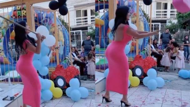 Madrina de fiesta infantil se hace viral en TikTok por pegarle a la piñata
